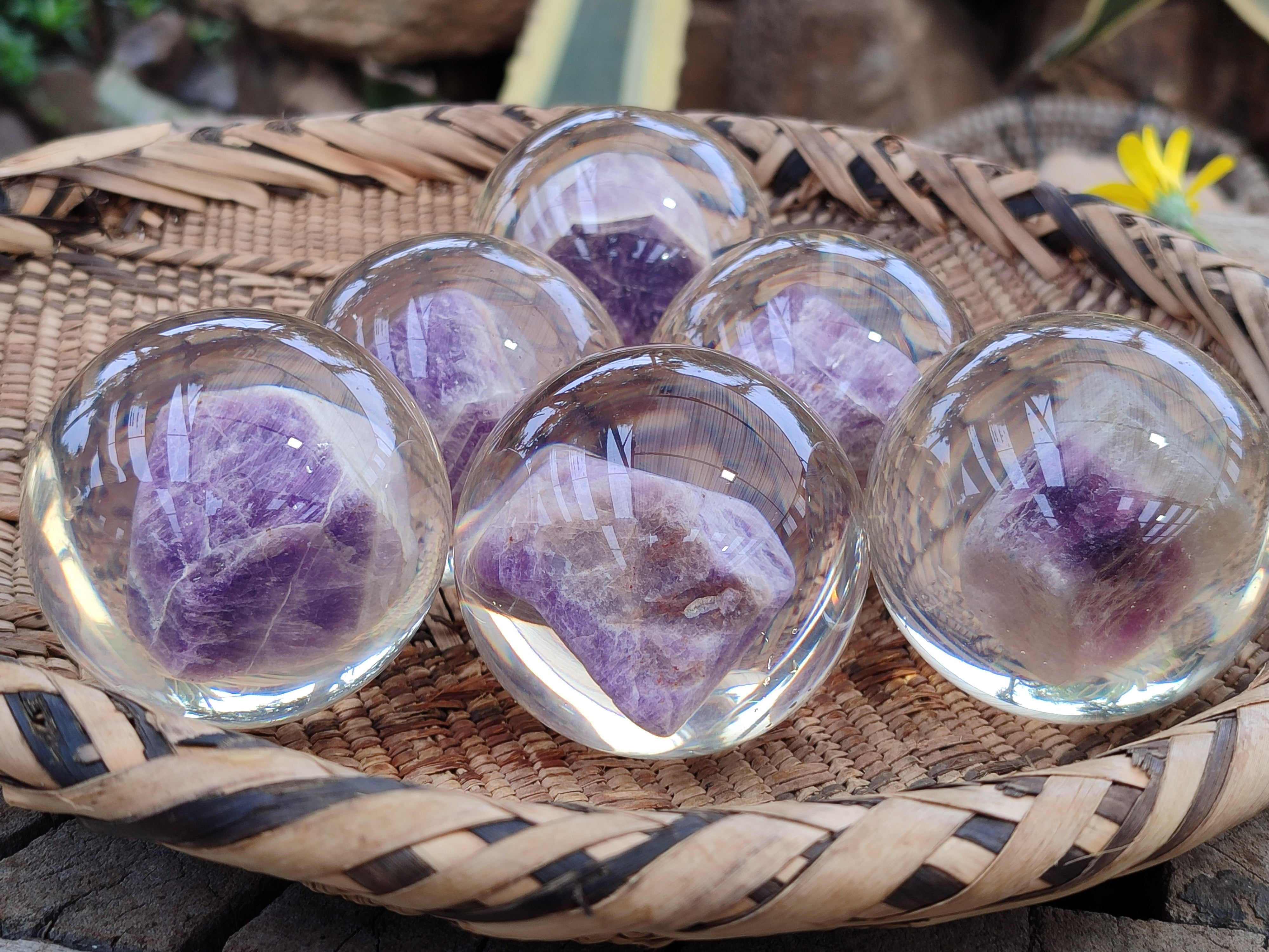 Polished Chevron Amethyst cobbed pieces in PVC Resin Spheres - sold pe ...
